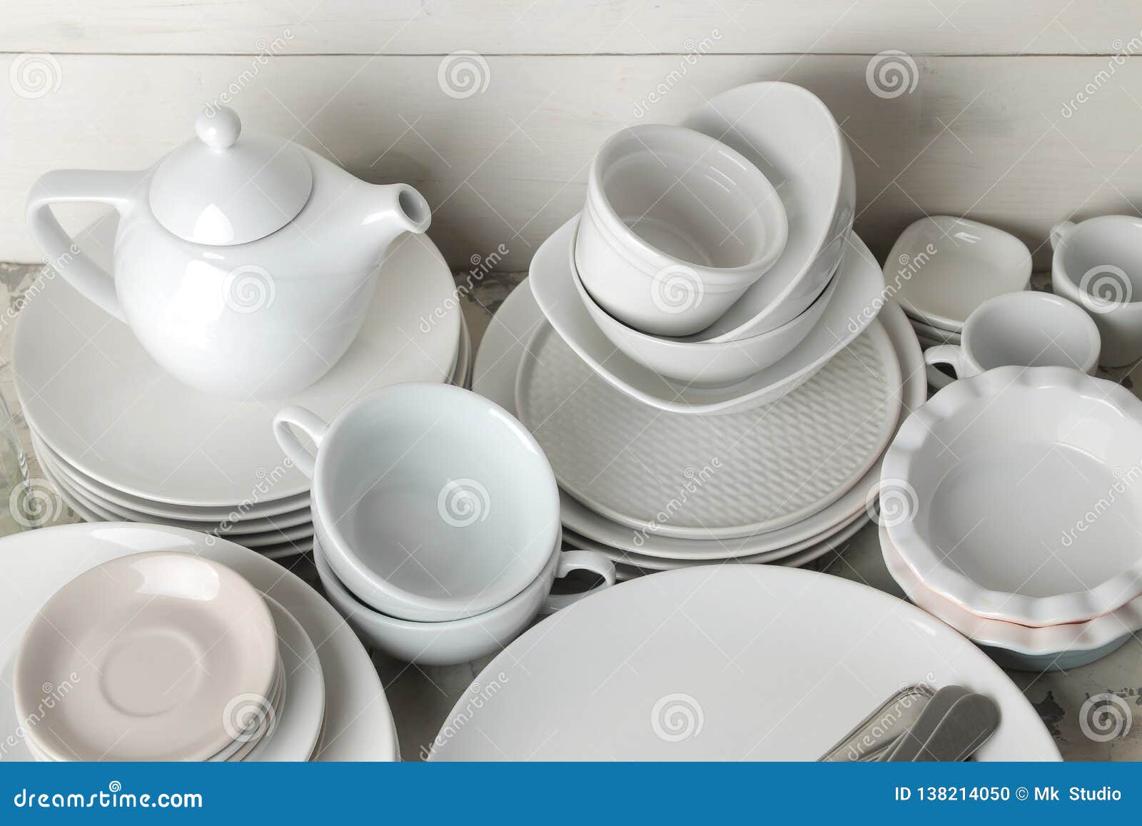A Lot of Different Dishes. Dinnerware. on a Light Concrete Background ...