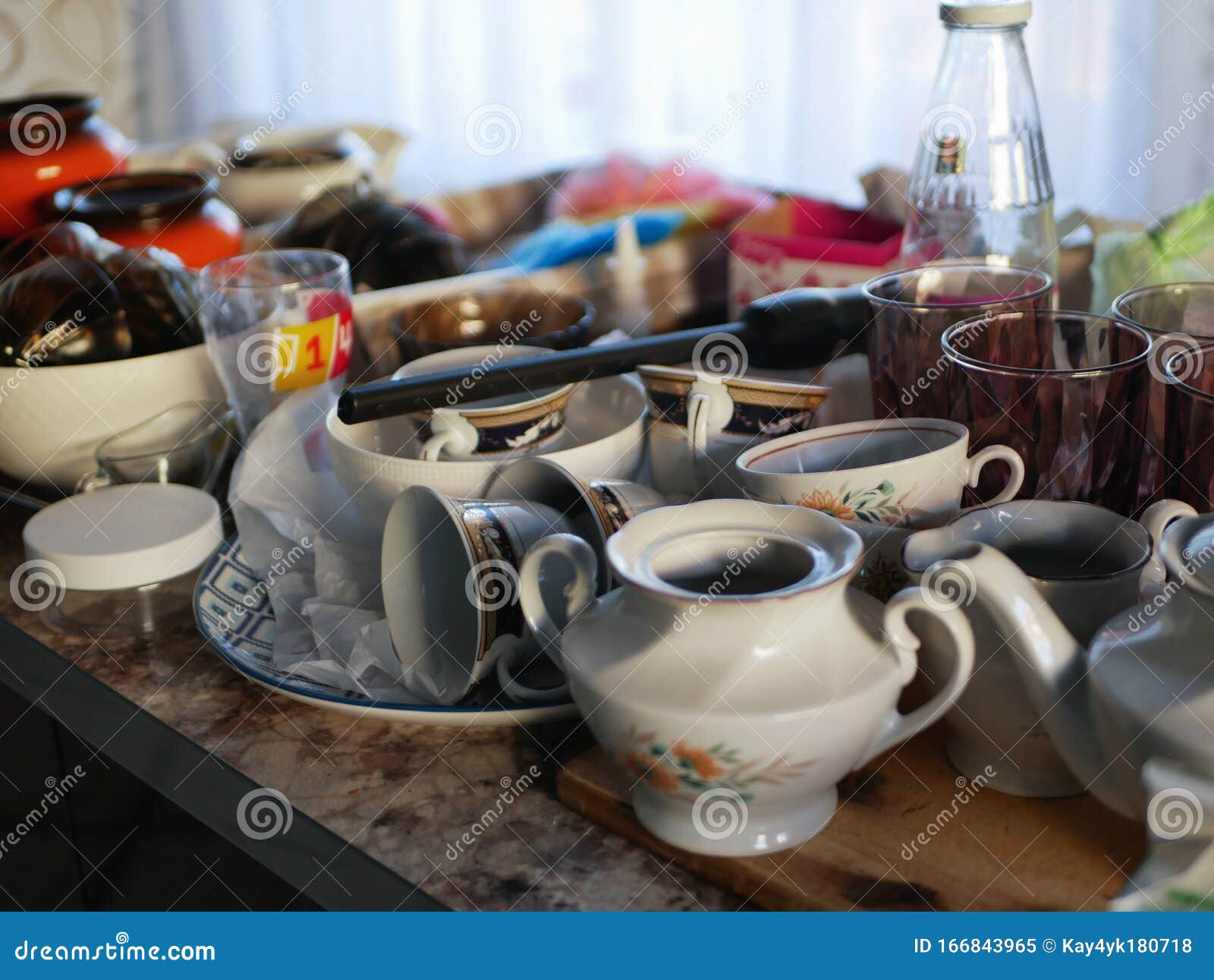 A Lot of Different Dishes on the Table. the Mess on the Table Stock ...