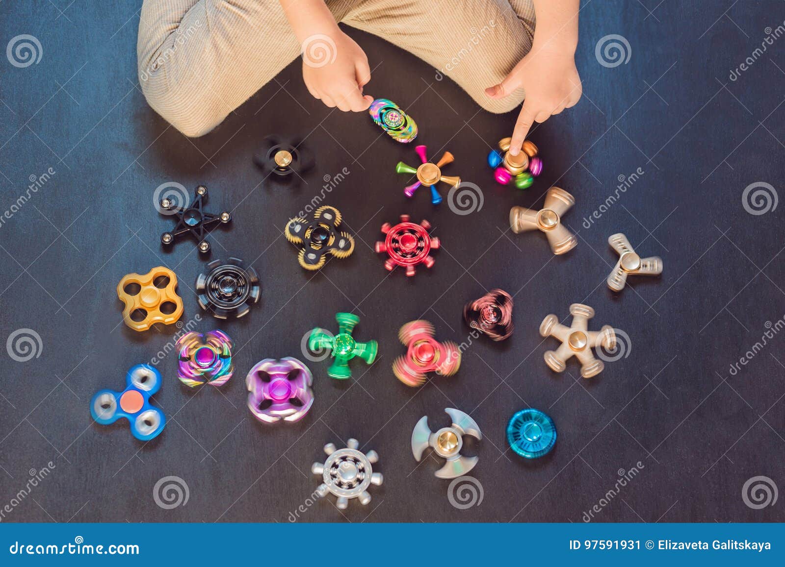 A Lot of Different Spinners on a Black Background Stock Image - Image ...