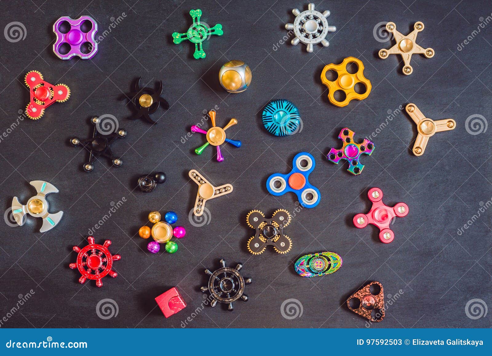 A Lot of Different Spinners on a Black Background Stock Image - Image ...