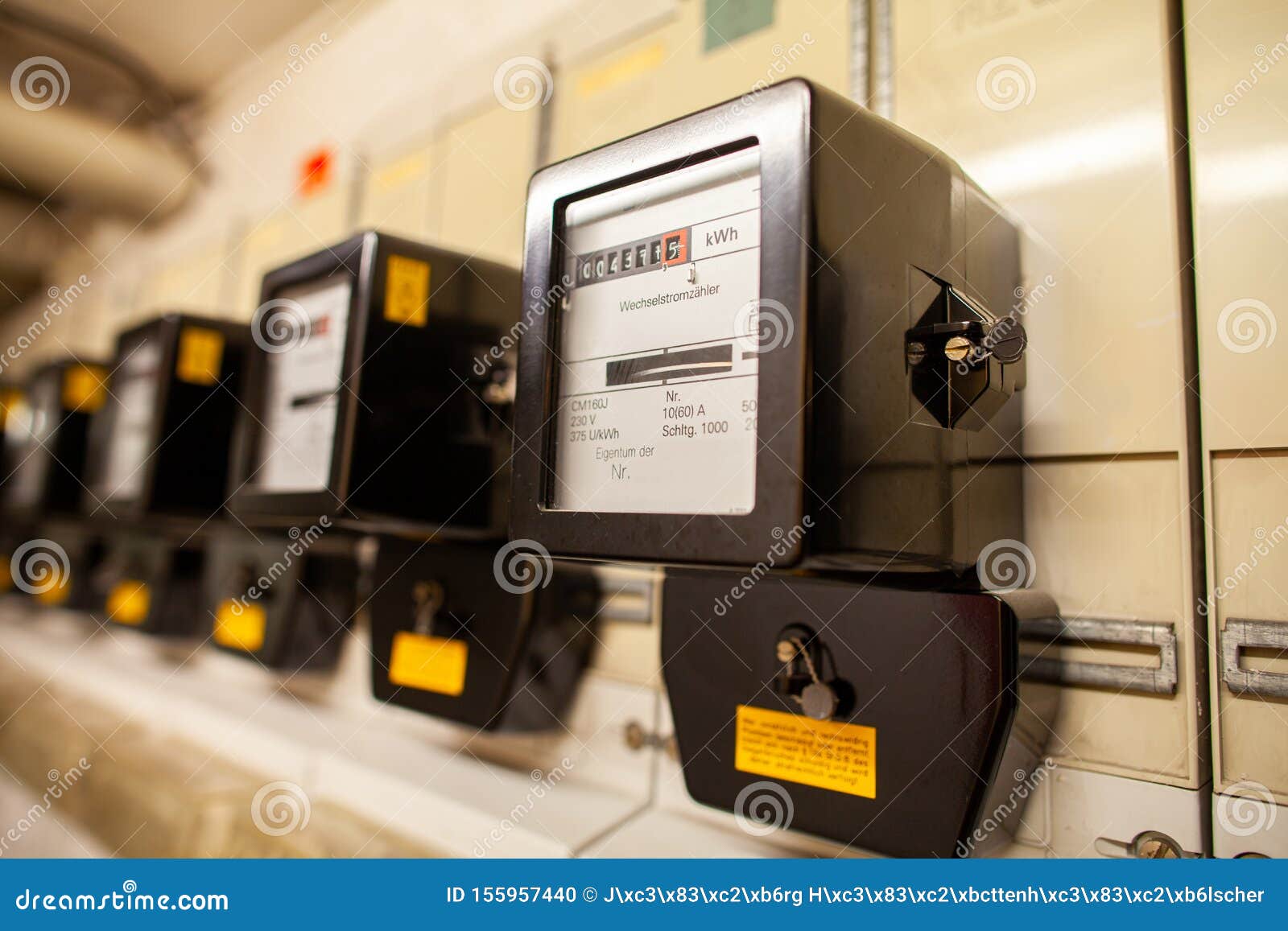 A Lot of Electric Meter Hangs in Basement Stock Photo - Image of ...