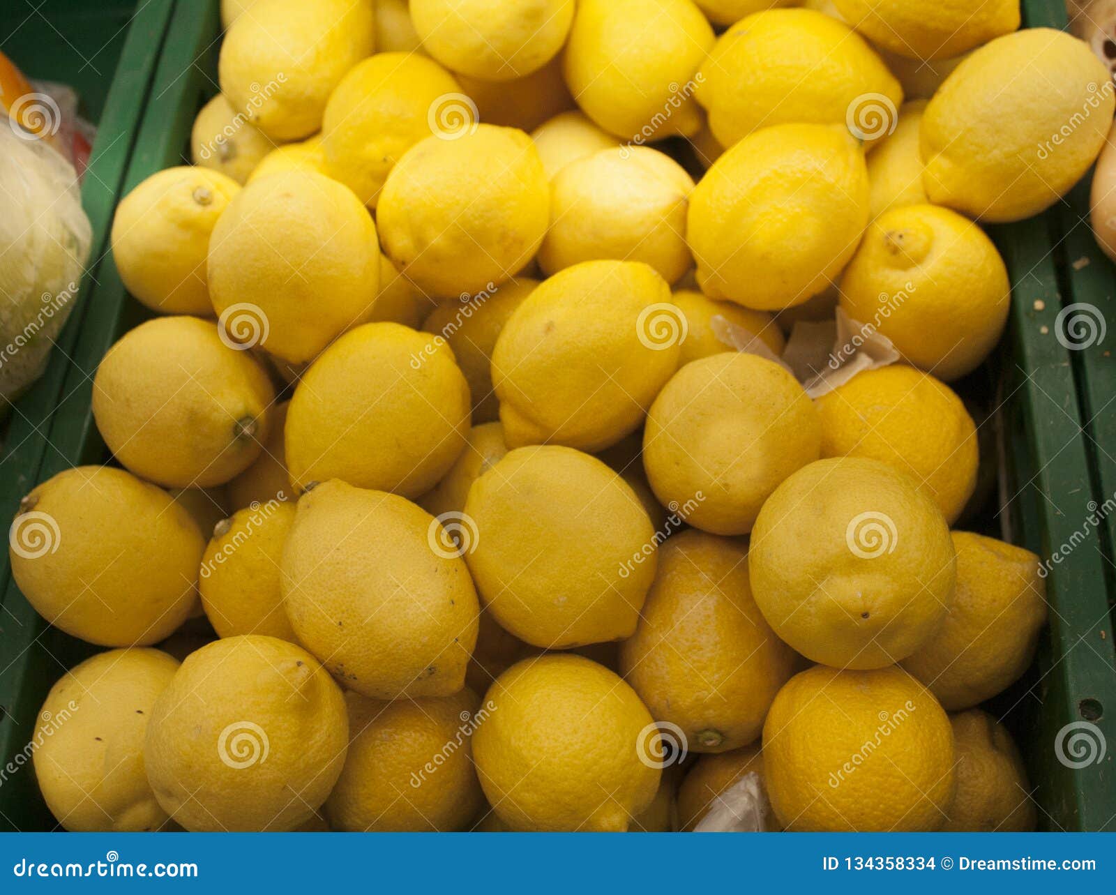 Fresh lemon on supermarket stock photo. Image of background - 134358334
