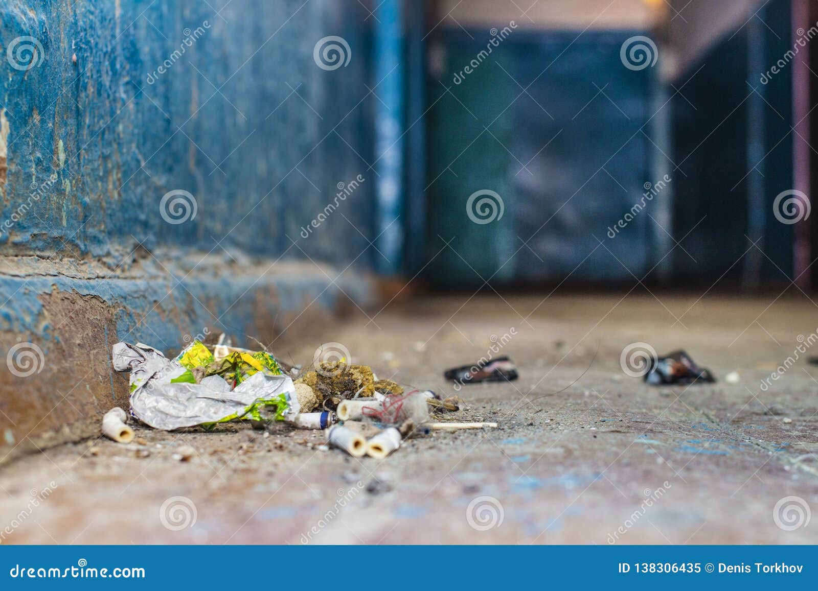 A Lot of Garbage on the Floor in the Hallway of the Hostel. Front and ...