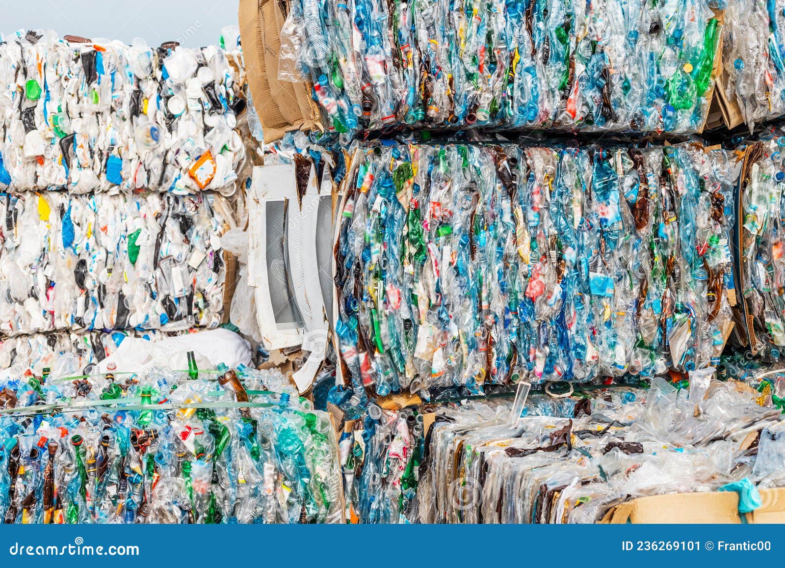 Plastic Garbage is Compressed by a Press and Bound into Pallets for ...