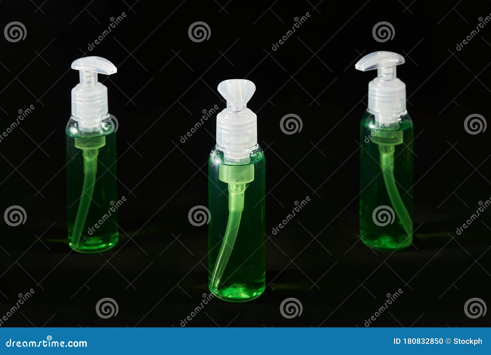 Lot of Sanitizer Hand Antiseptics. Dark Background Stock Photo - Image ...