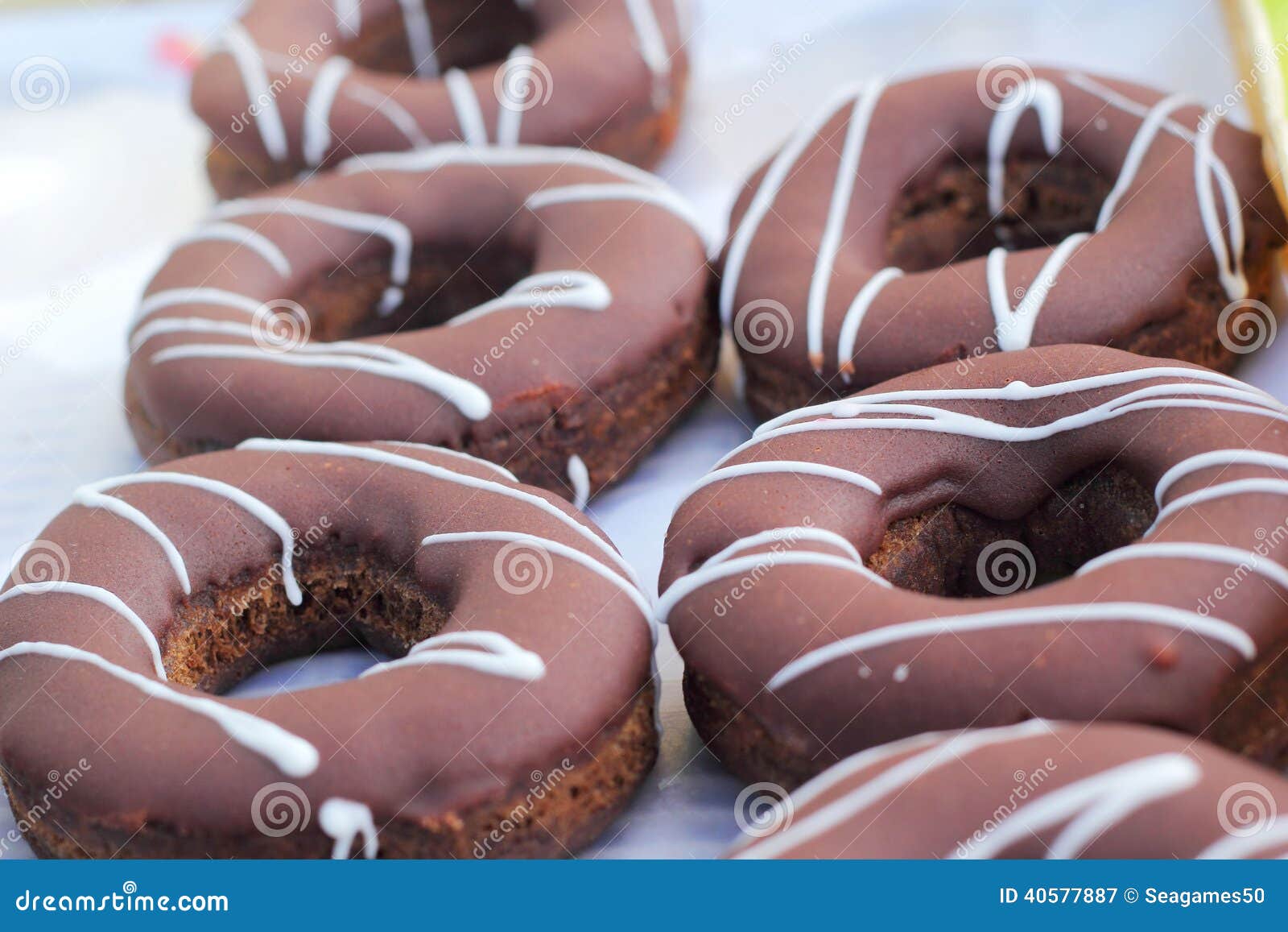 A Lot of Tasty Chocolate Donuts Stock Image - Image of chocolate, baked ...