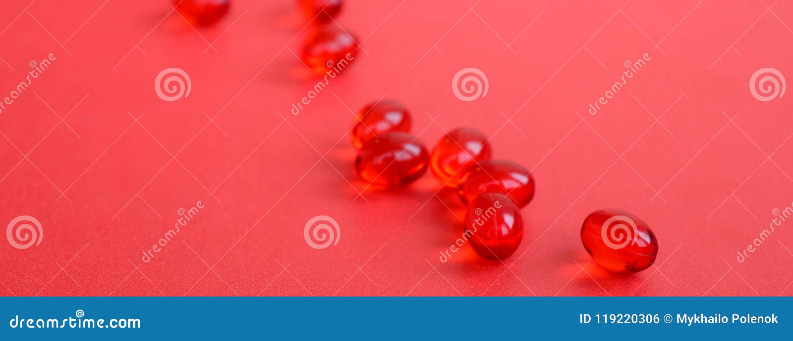 A Lot of Transparent Red Tablets Lie on the Red Surface Stock Photo ...