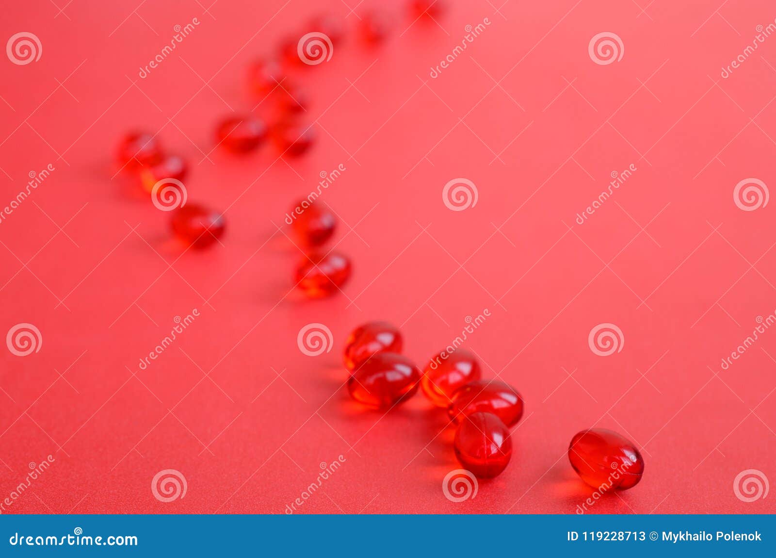A Lot of Transparent Red Tablets Lie on the Red Surface Stock Image ...