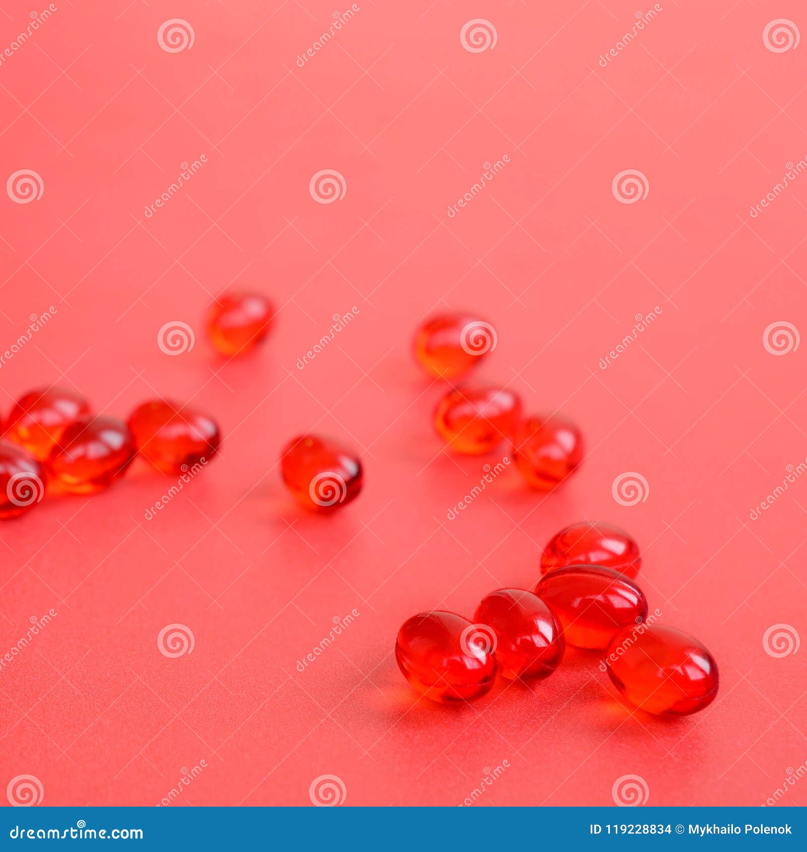 A Lot of Transparent Red Tablets Lie on the Red Surface Stock Photo ...