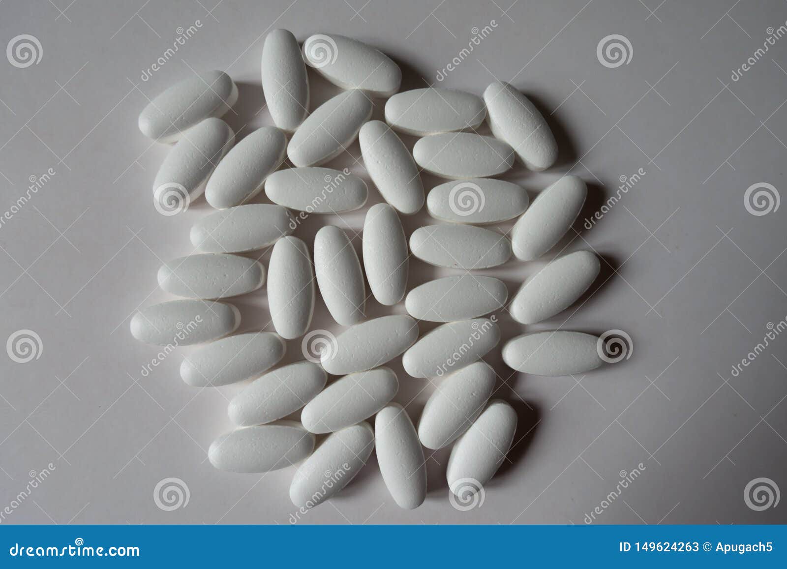 Lots of Big White Oblong Caplets of Calcium Citrate Stock Image - Image ...