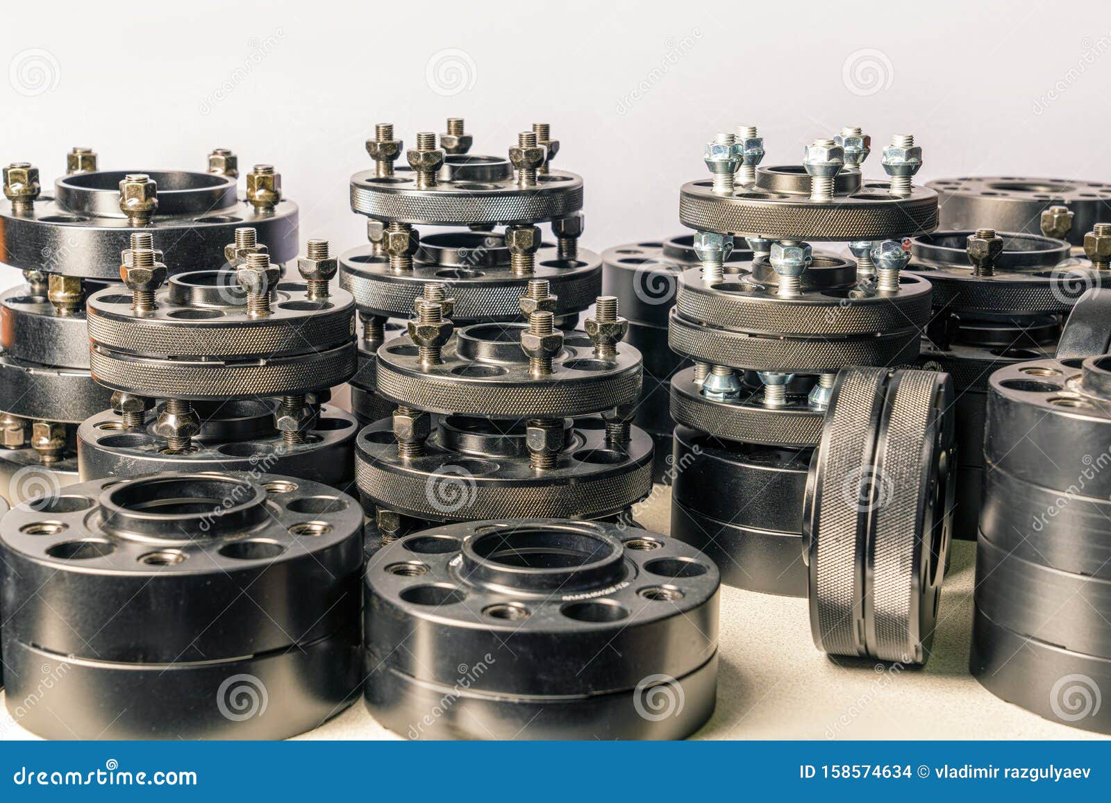 Lots of Black Wheel Spacers for Car Hubs and Wheels. Increase and ...