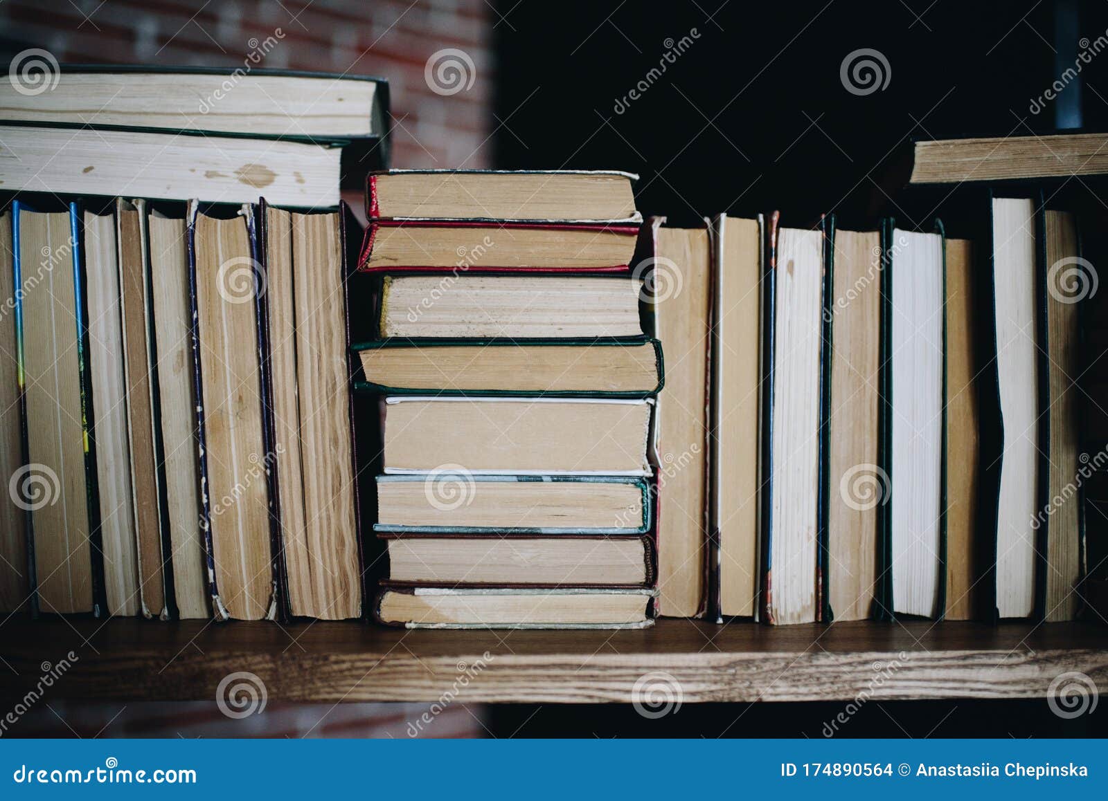 Lots of Books Sideways on a Shelf in the Library Stock Photo - Image of ...