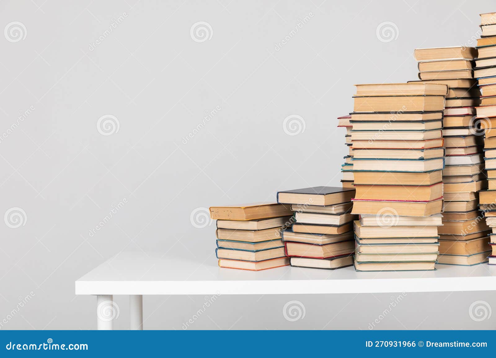 Lots of Books Stacked on the Table for Studying at the University ...