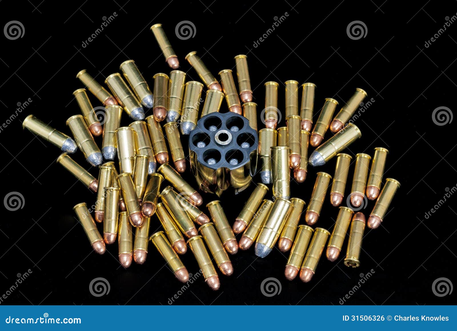 Lots of Bullets and Revolver Loader Stock Photo - Image of brass, brown ...