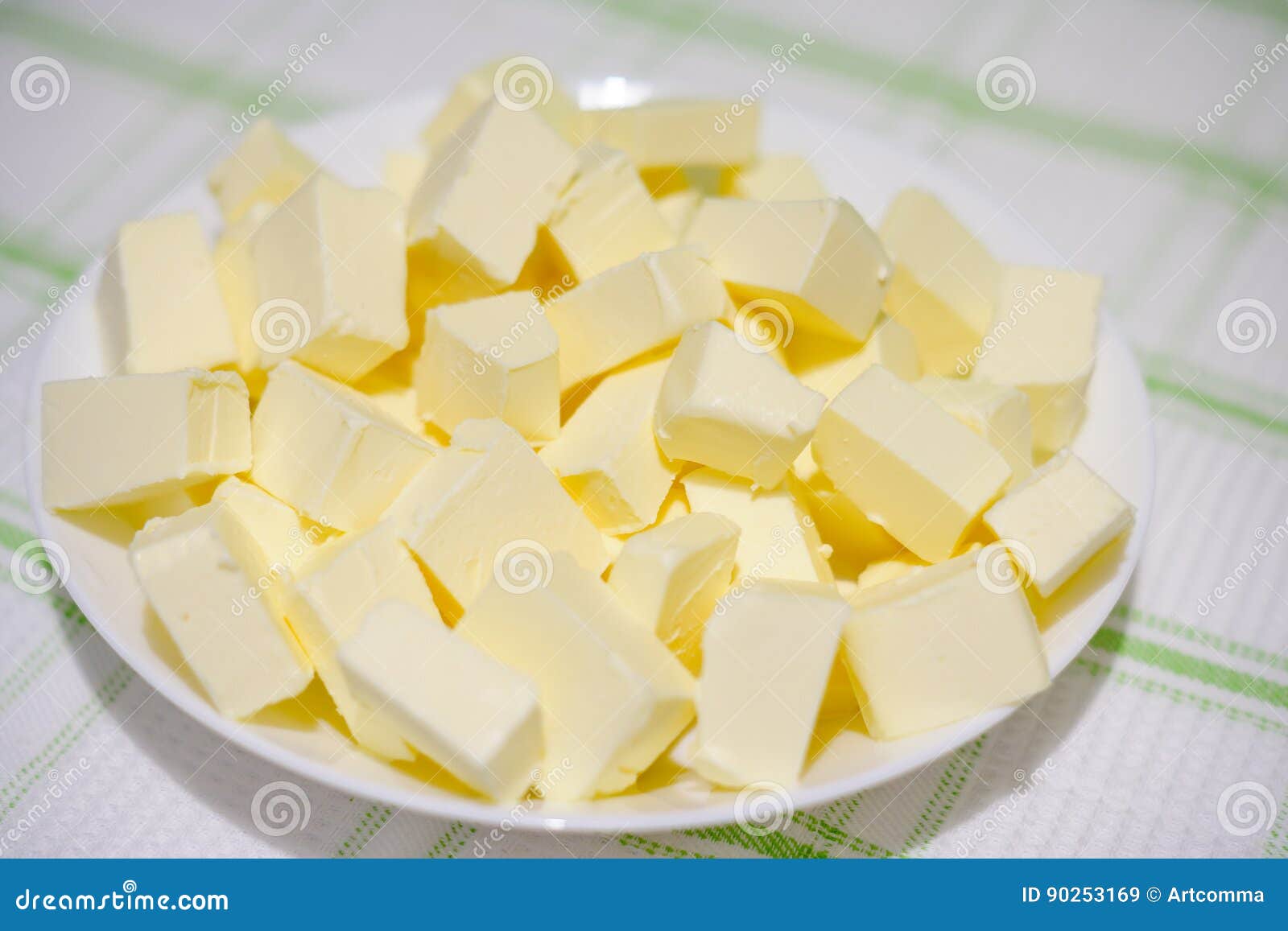 Lots of Butter, Cut into Pieces Stock Image - Image of plate, yellow ...
