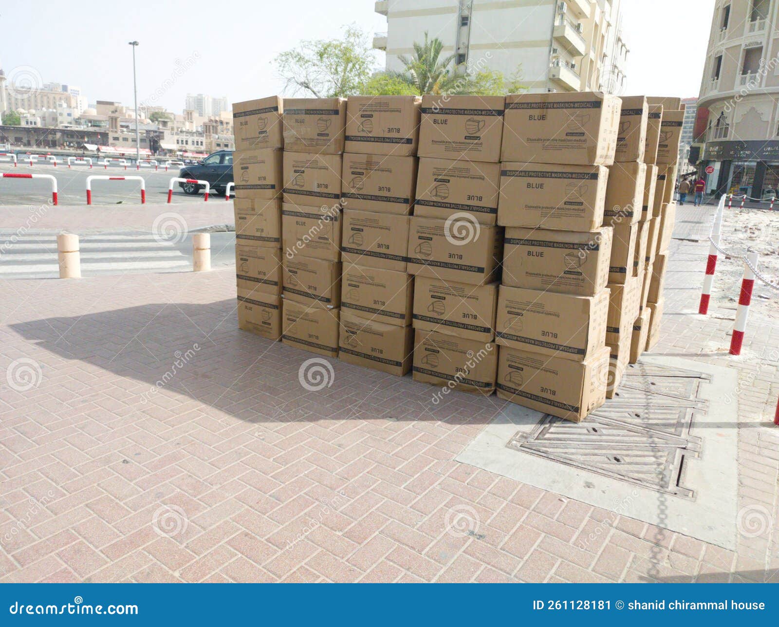 Many Carton Boxes And A Blue Renewi Container, Garbage On The Streets ...