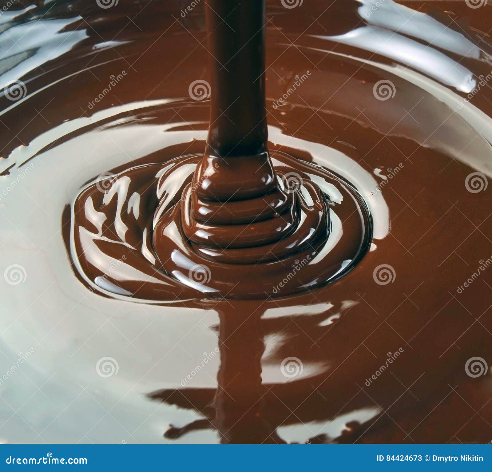 Lots of chocolate falling stock image. Image of splash - 84424673