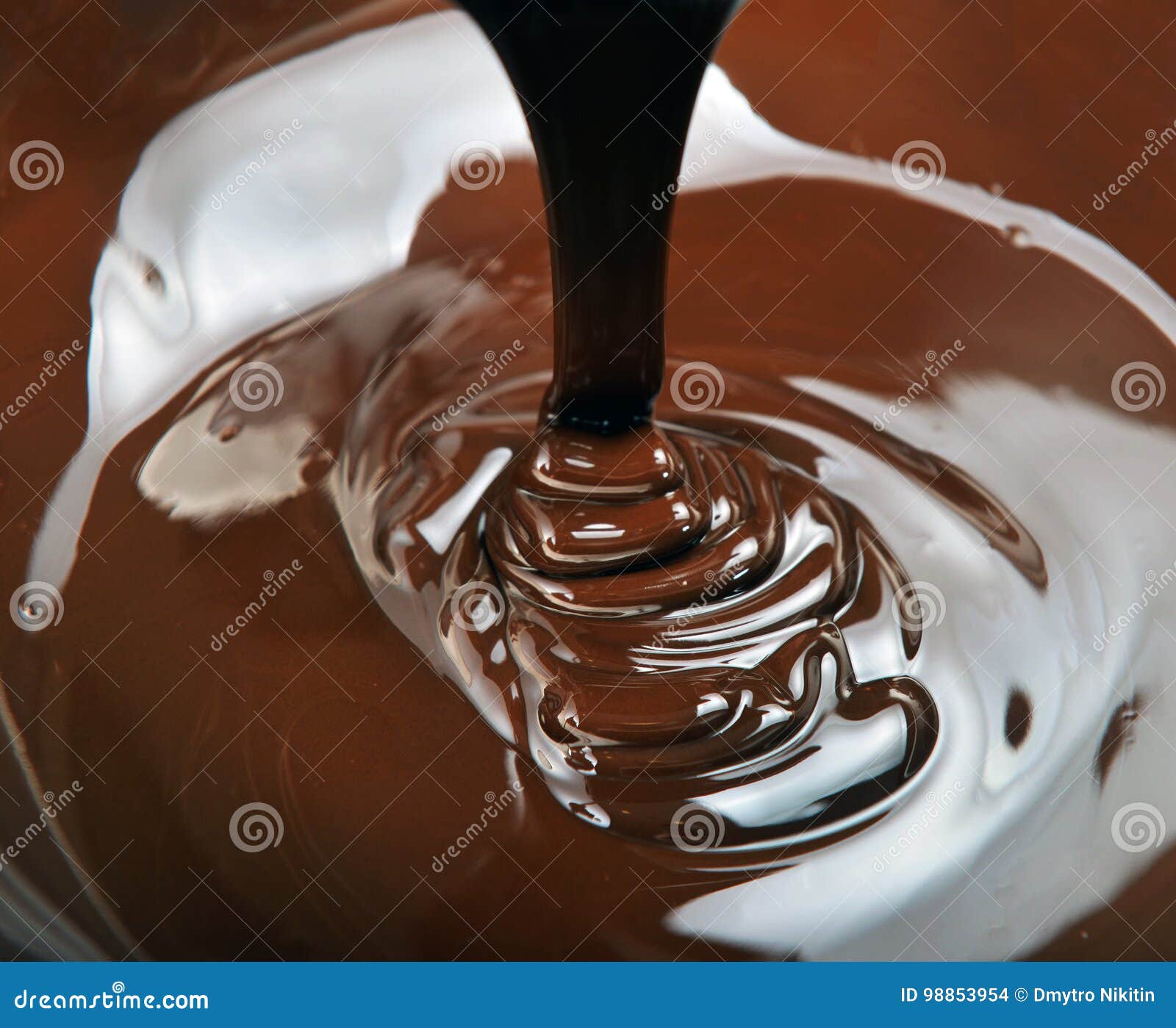 Lots of chocolate falling stock photo. Image of pouring - 98853954