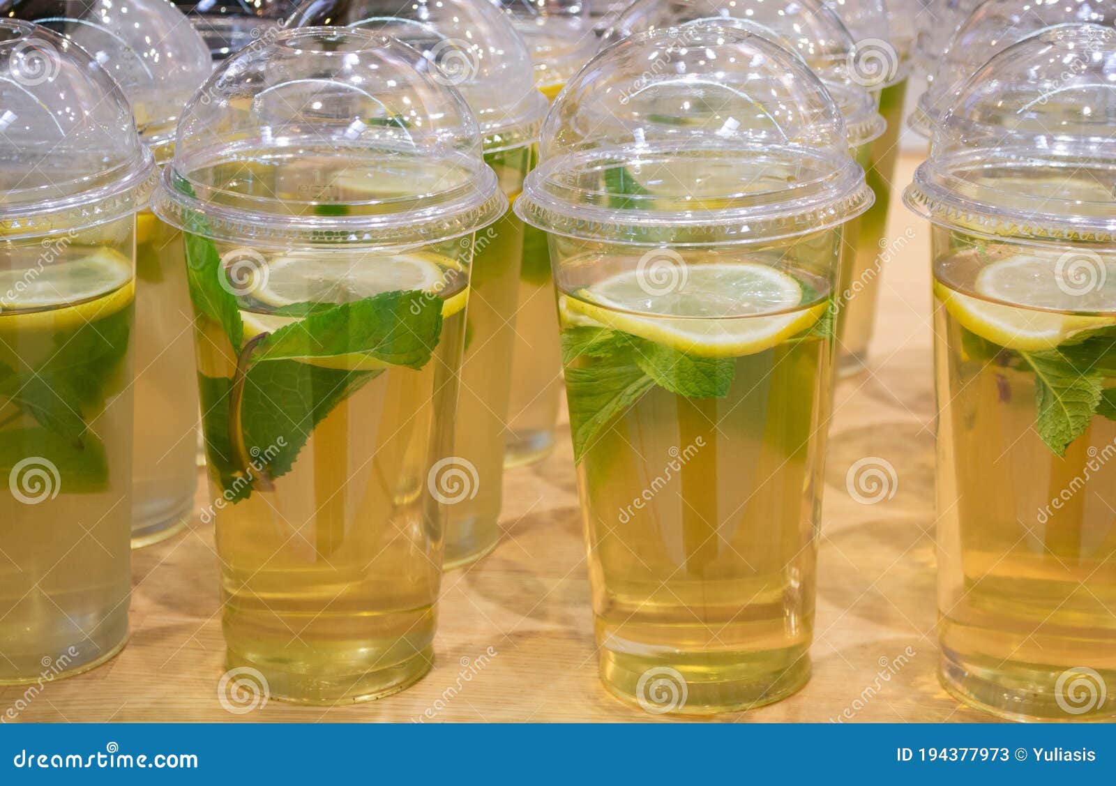 Lots of Clear Plastic Cups with a Lid and Lemonade, or Green Tea with ...