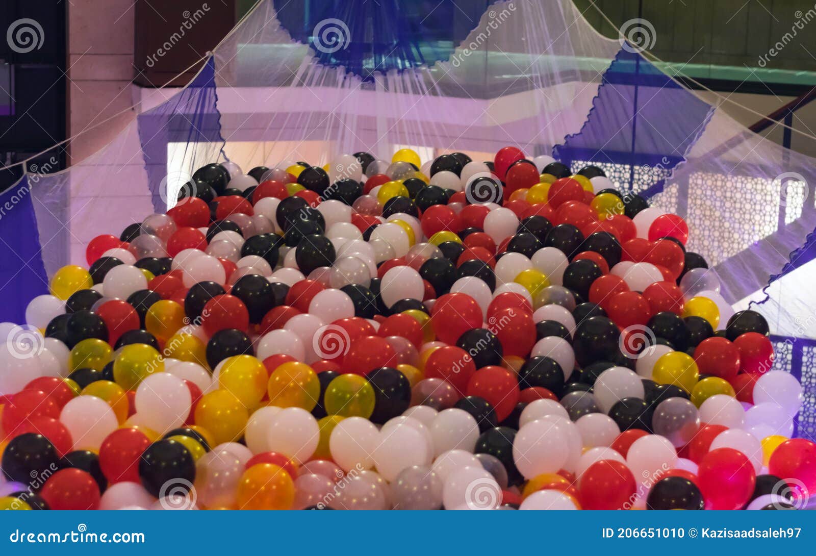 Lots of colourful balloons stock photo. Image of inside - 206651010