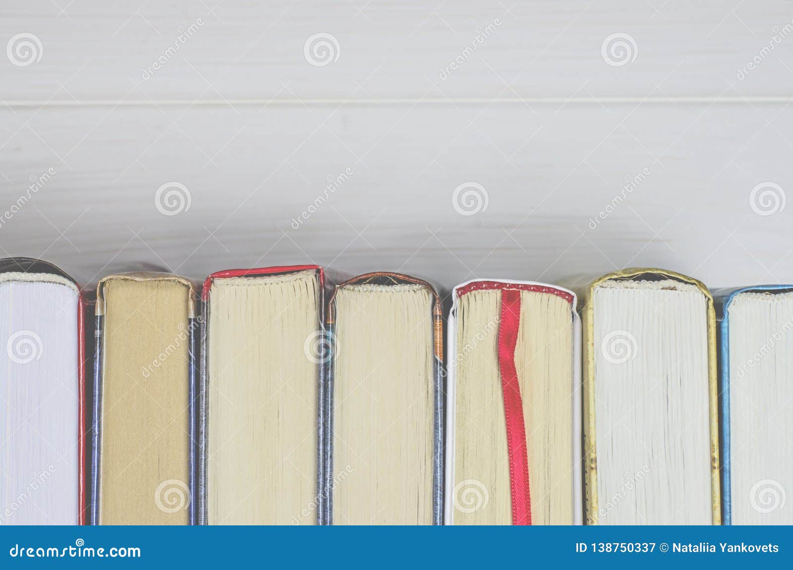 Lots of Colourful Thick Open Books Stand on a White Background Stock ...