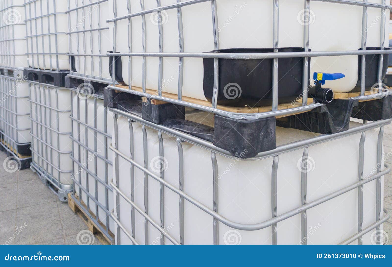 Lots of cube water tanks stock photo. Image of feed - 261373010
