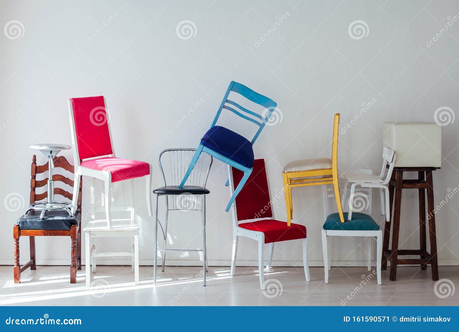 Lots of Different Chairs in the Interior of an Empty White Room Stock ...