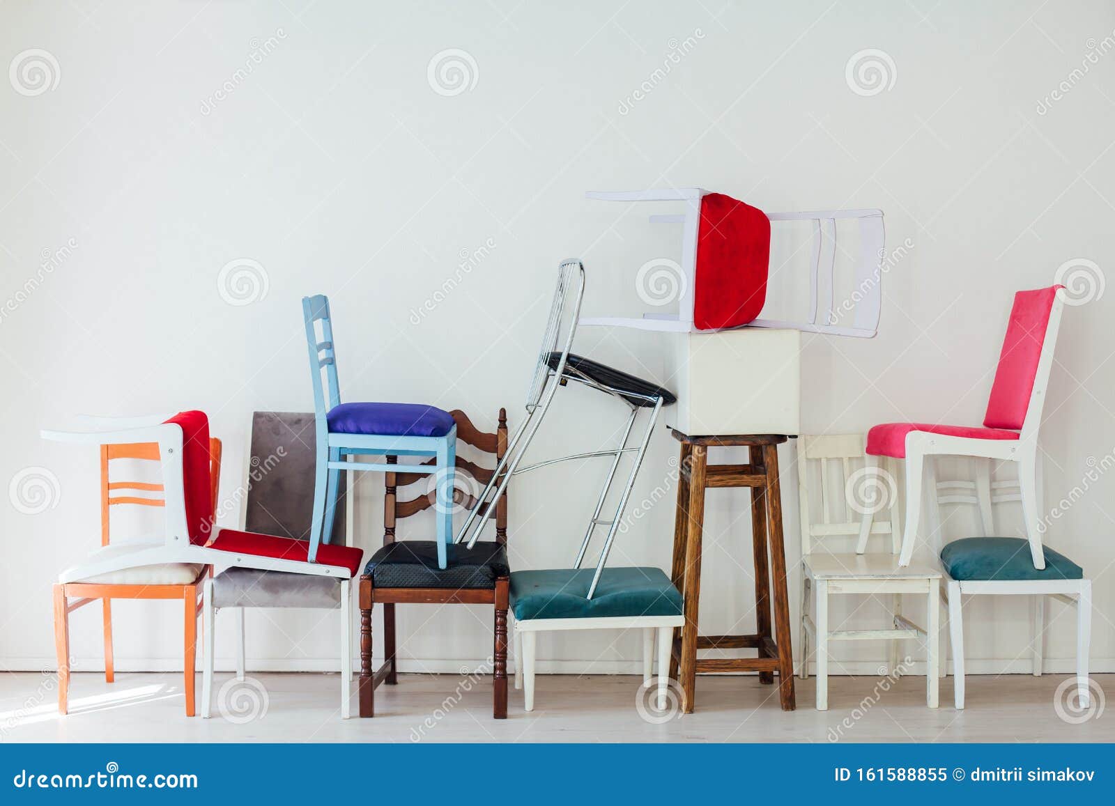 Lots of Different Chairs in the Interior of an Empty White Room Stock ...