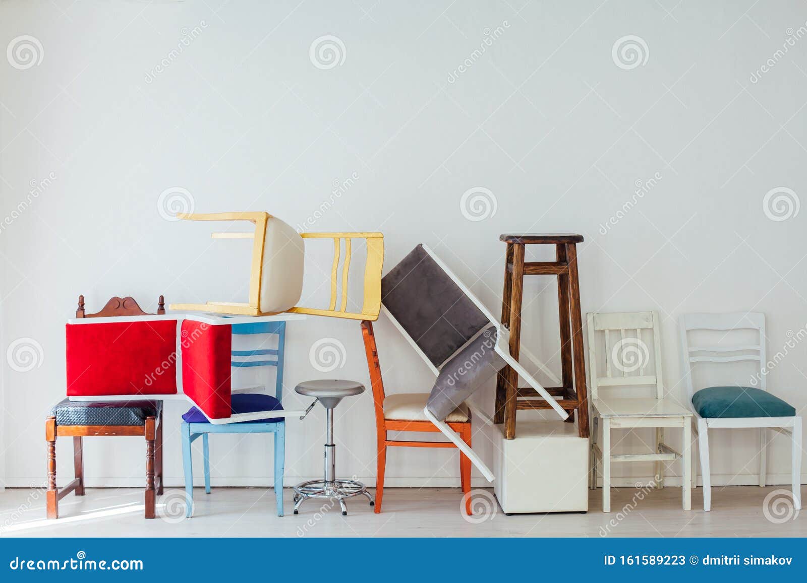 Lots of Different Chairs in the Interior of an Empty White Room Stock ...