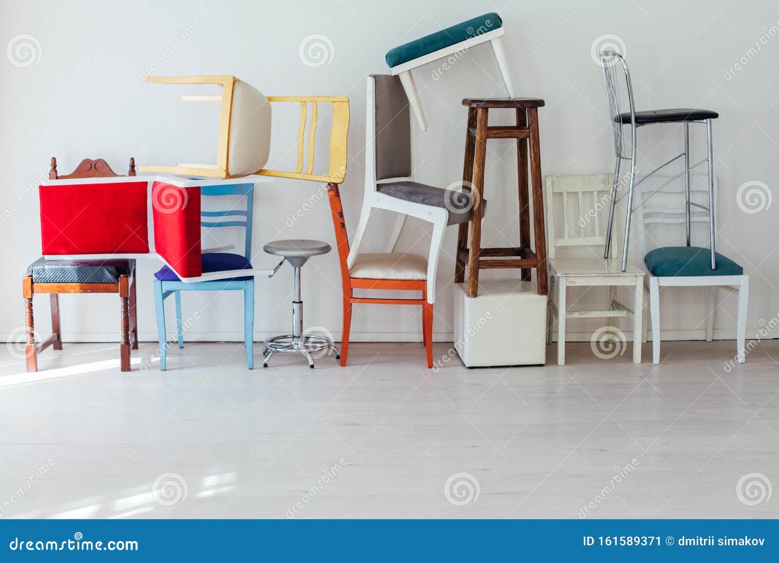 Lots of Different Chairs in the Interior of an Empty White Room Stock ...