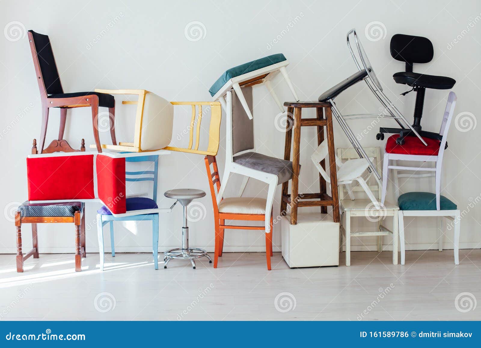 Lots of Different Chairs in the Interior of an Empty White Room Stock ...