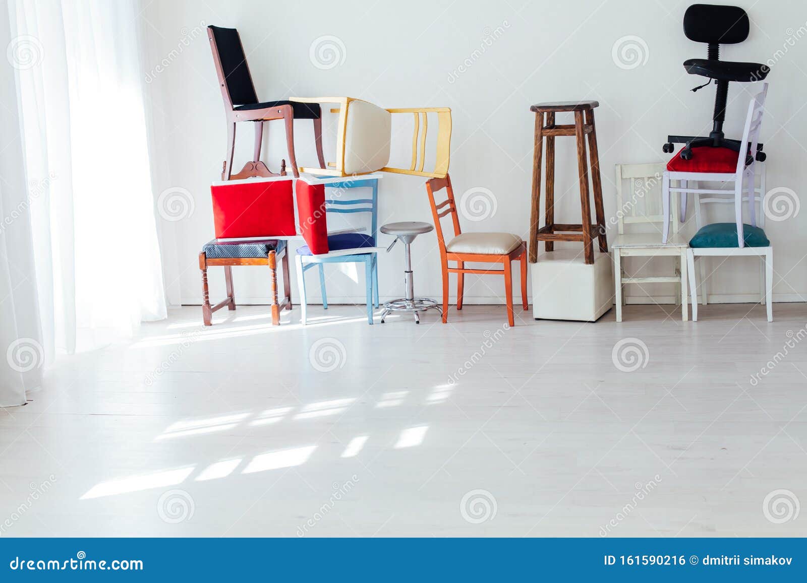 Lots of Different Chairs in the Interior of an Empty White Room Stock ...