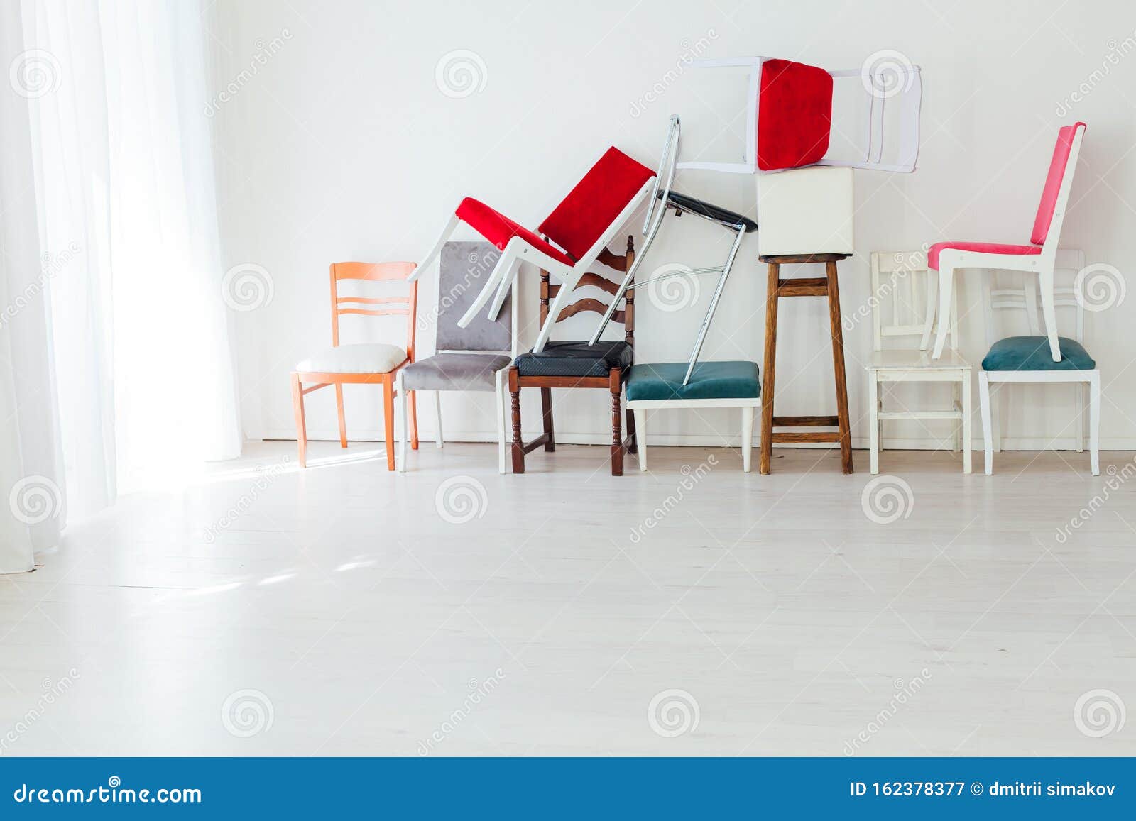 Lots of Different Chairs in the Interior of the White Room Stock Image ...