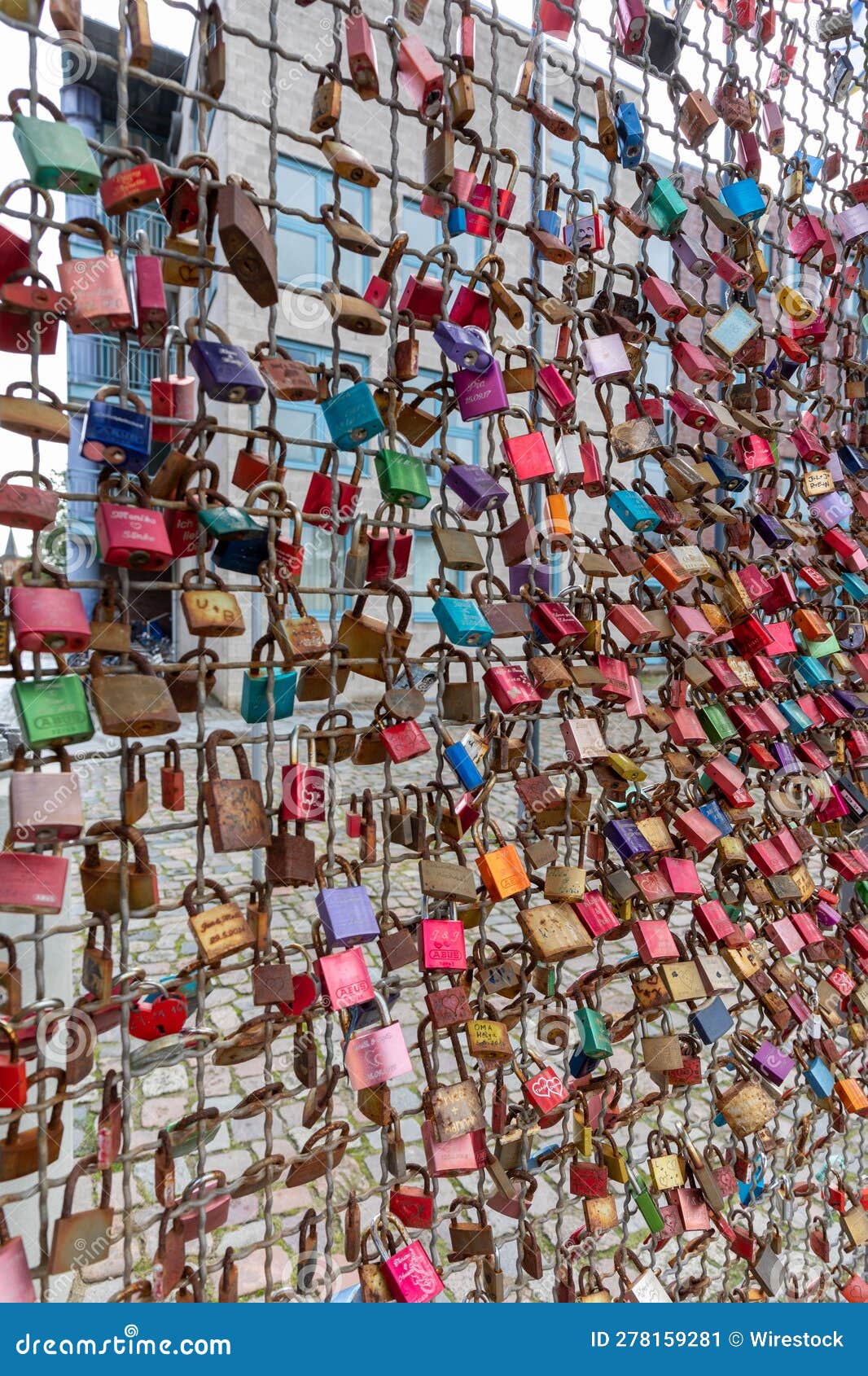 Lots of Different Color Padlocks are Attached To a Wire Fence Editorial ...