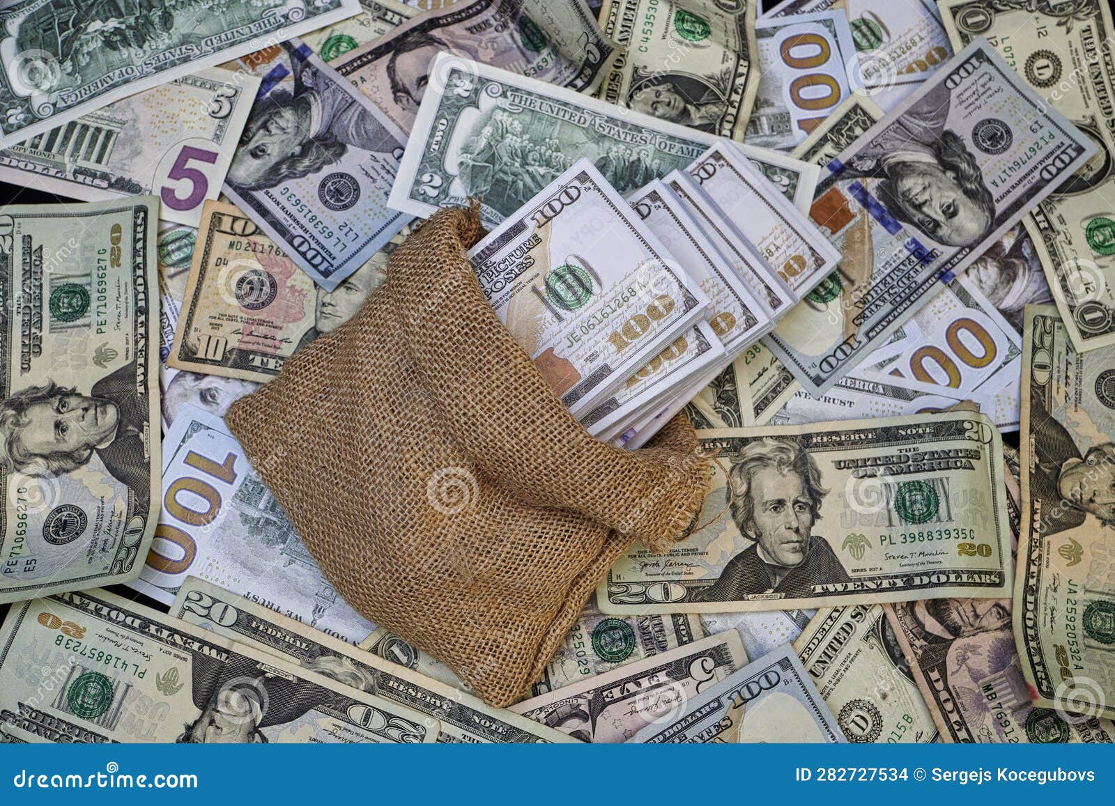 Lots of Different Dollar Bills on the Table Background Texture Stock ...