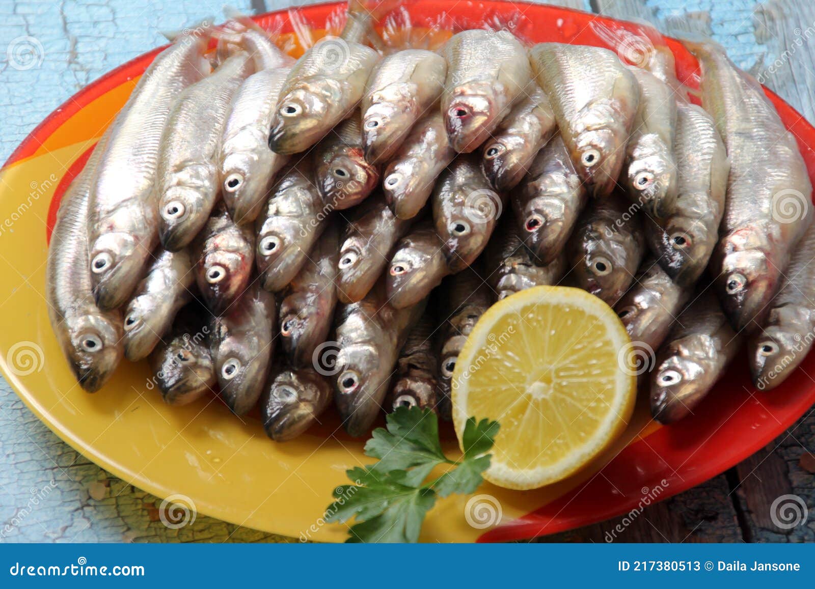 Lots of Fresh Smelt Fish on White Plate, Gutted Fish Stock Image ...