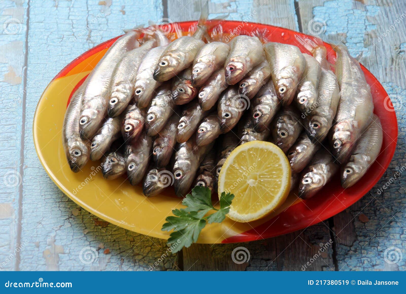 Lots of Fresh Smelt Fish on White Plate, Gutted Fish Stock Image ...