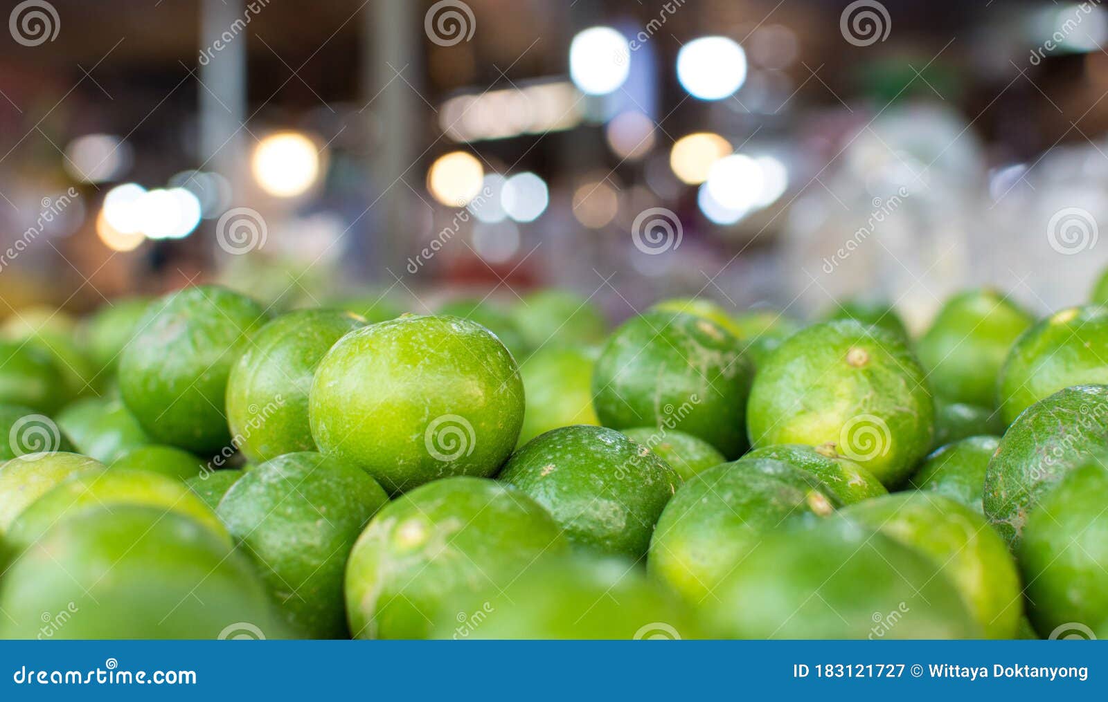 Lots of Green Lemons at the Fresh Market Stock Image - Image of fruit ...