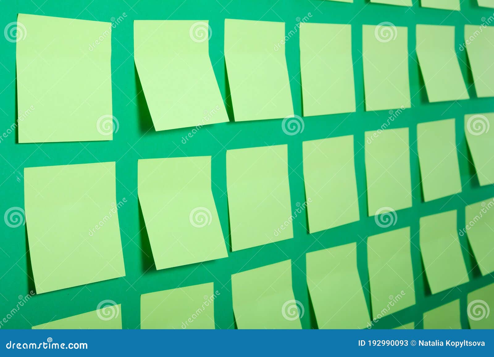 Many Light Green Sticky Notes on a Green Background, Selective Focus ...
