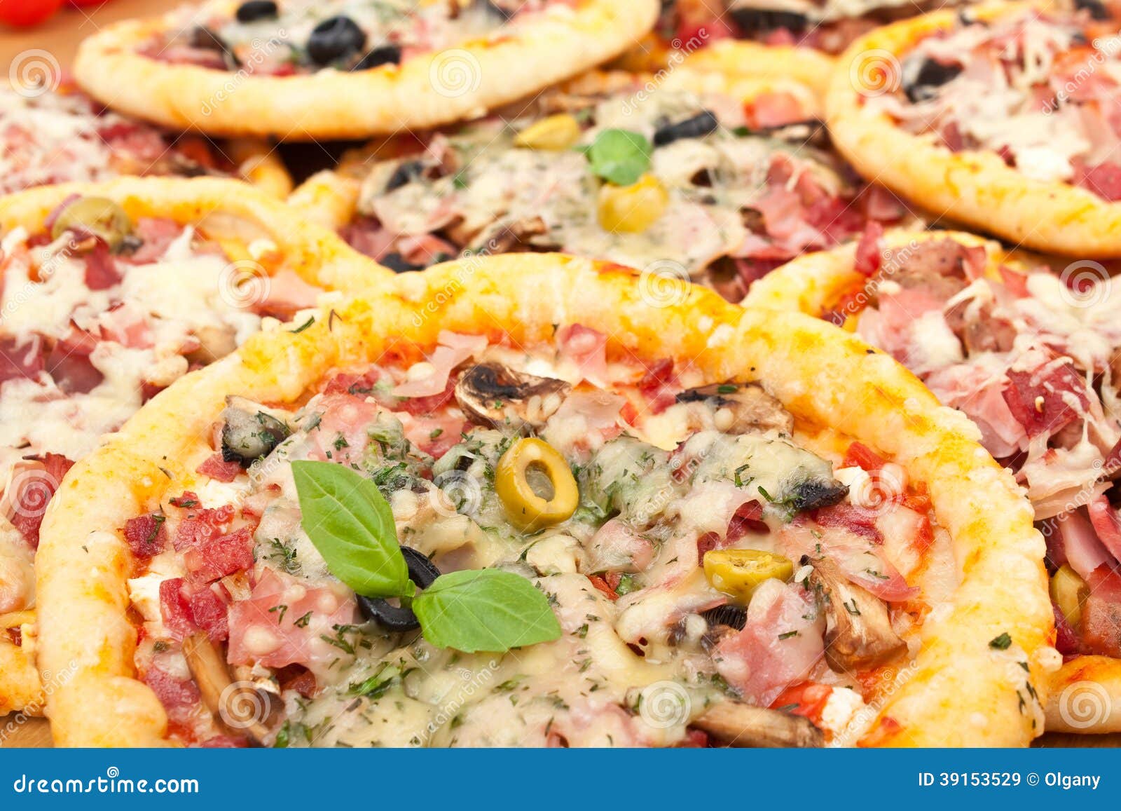 Lots of Mini Pizzas stock image. Image of edible, crusty - 39153529