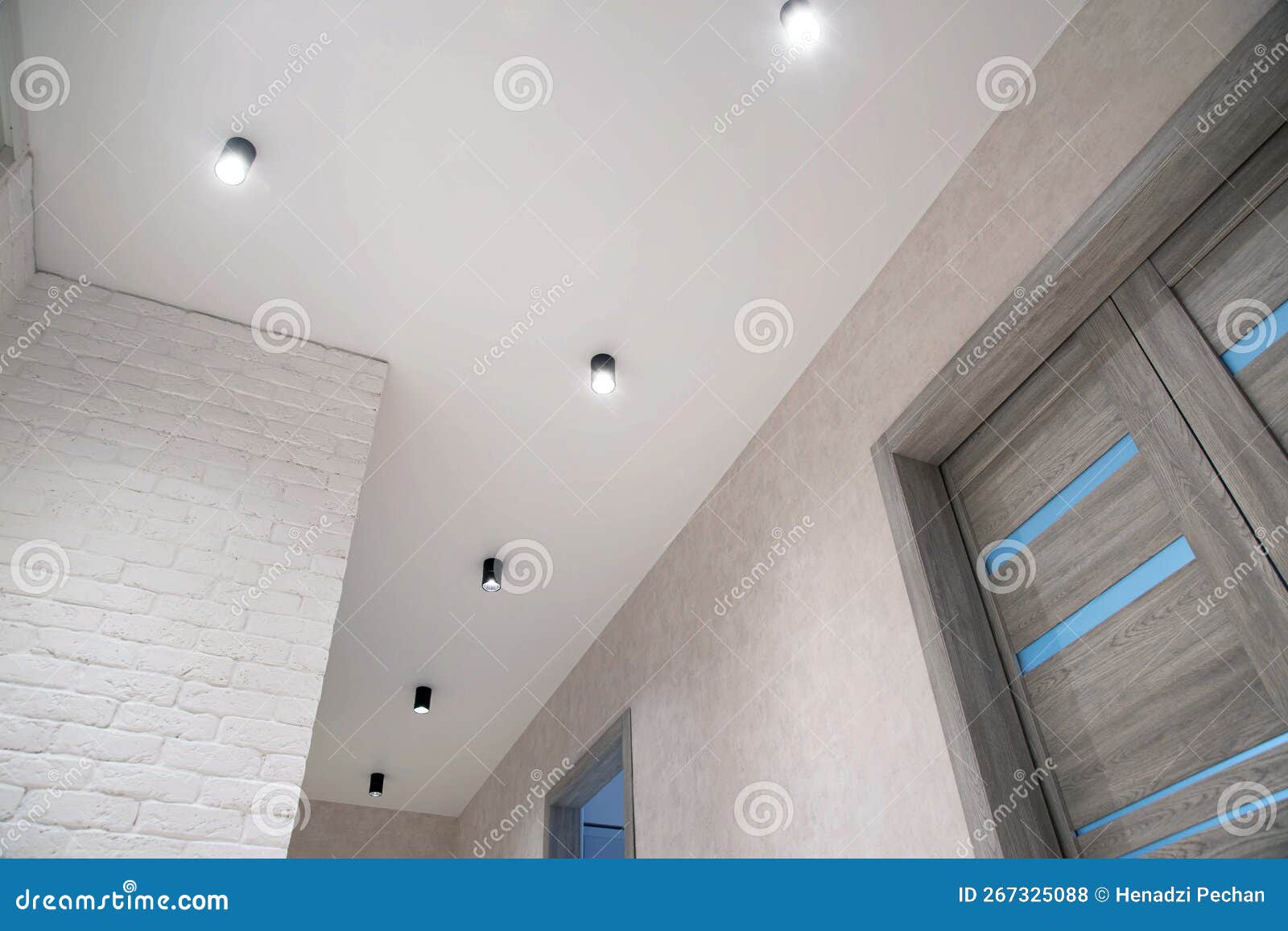 Lots of Modern LED Spotlights on the Stretch Ceiling in the Hallway ...