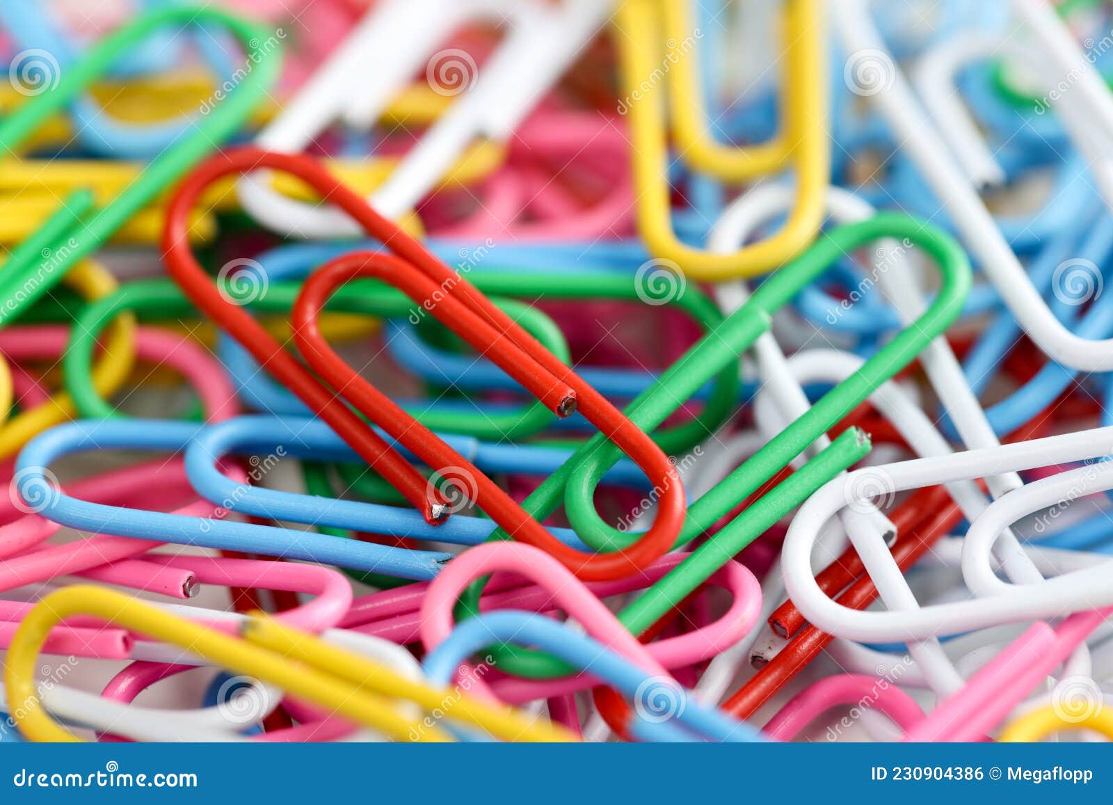 Lots of Multi-colored Paper Clips of Same Size on Table. Stock Photo ...