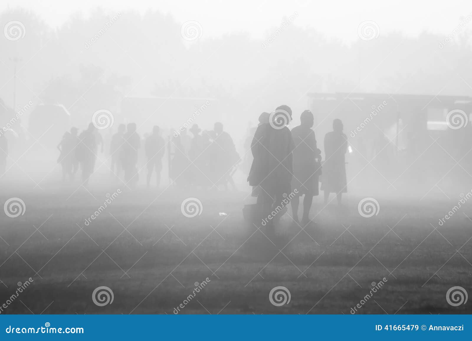 Lots of people in the dust stock image. Image of blurred - 41665479