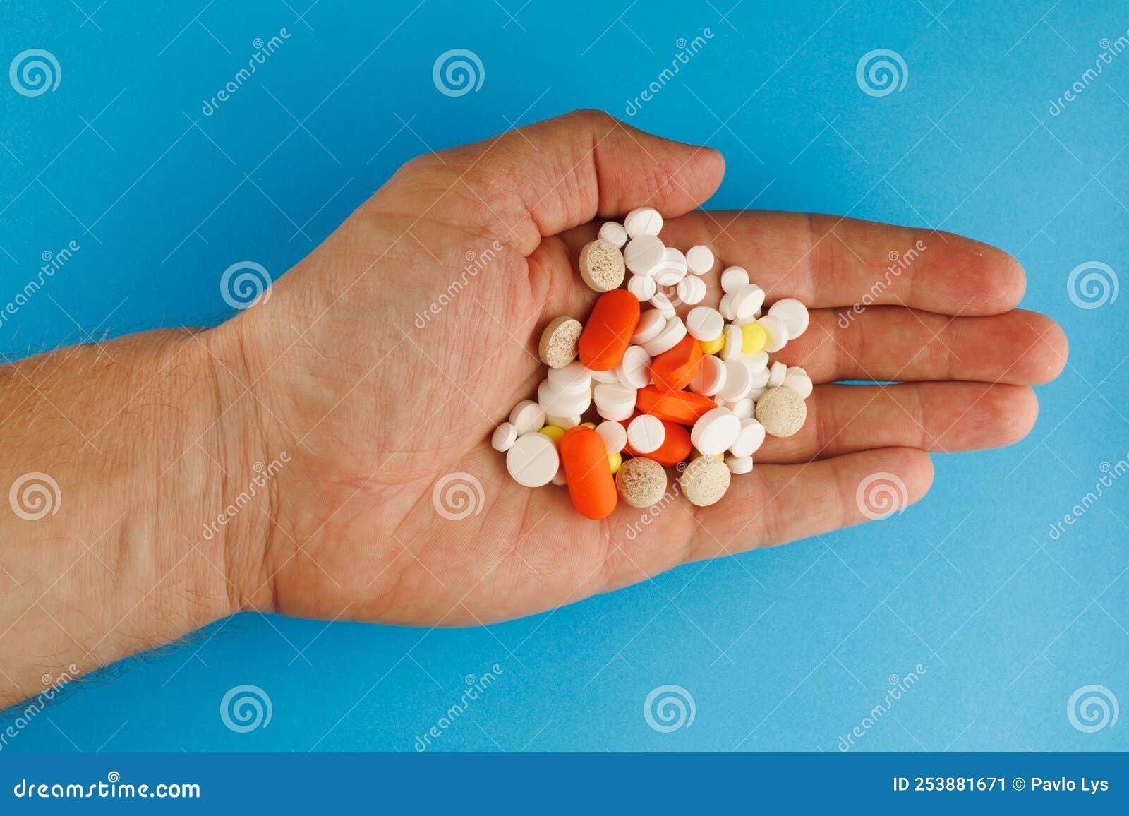 Lots of pills in hand stock image. Image of health, closeup - 253881671