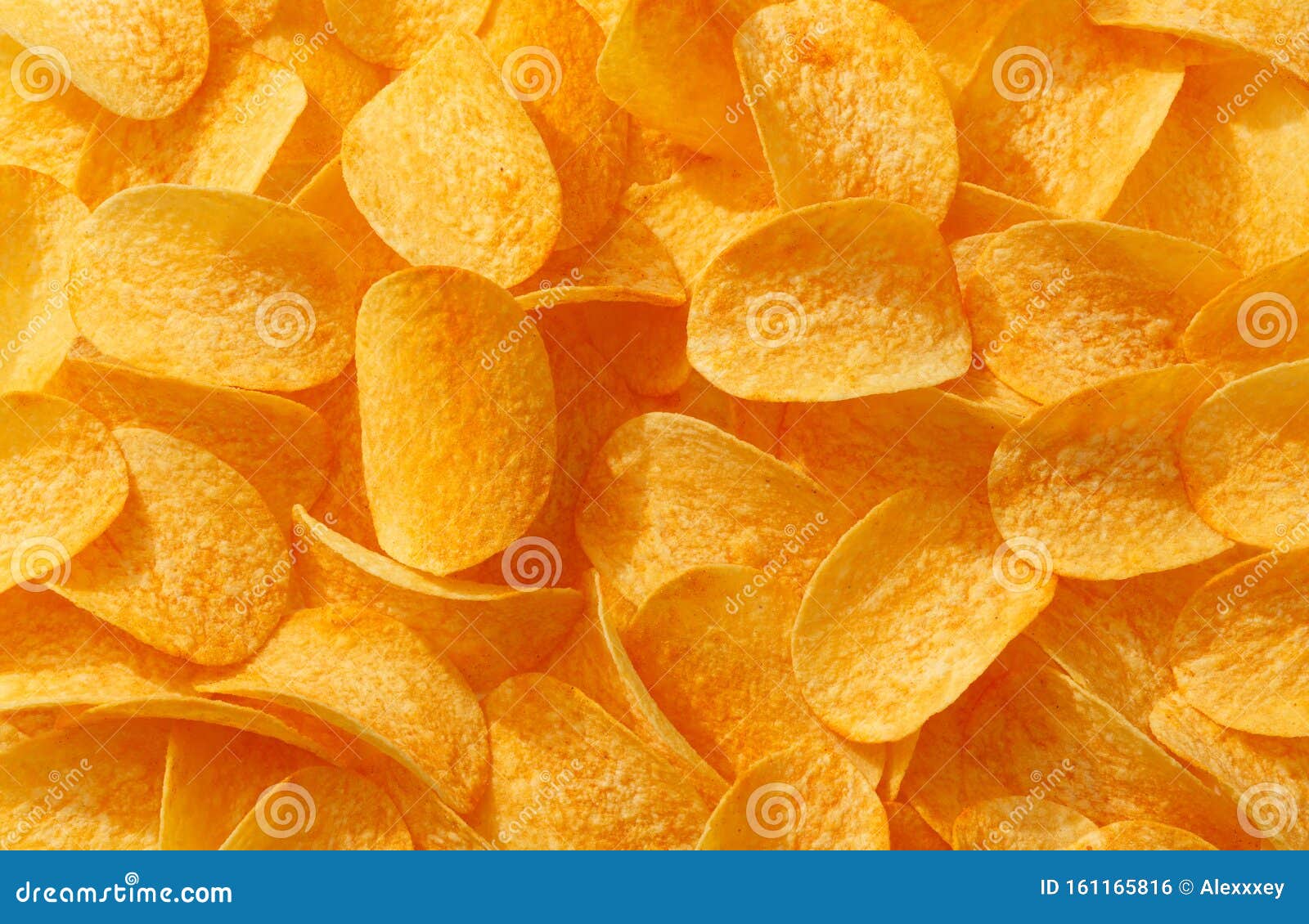 Lots of potato chips stock photo. Image of close, chips - 161165816