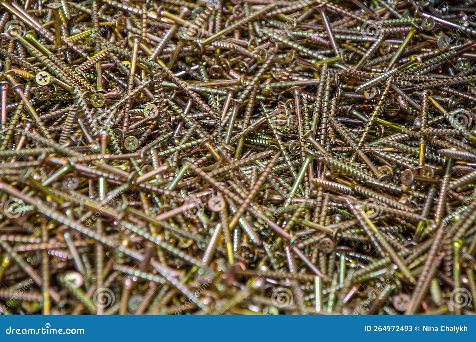 Lots of Small Gold-colored Brass Screws. Self-tapping Screws Texture ...