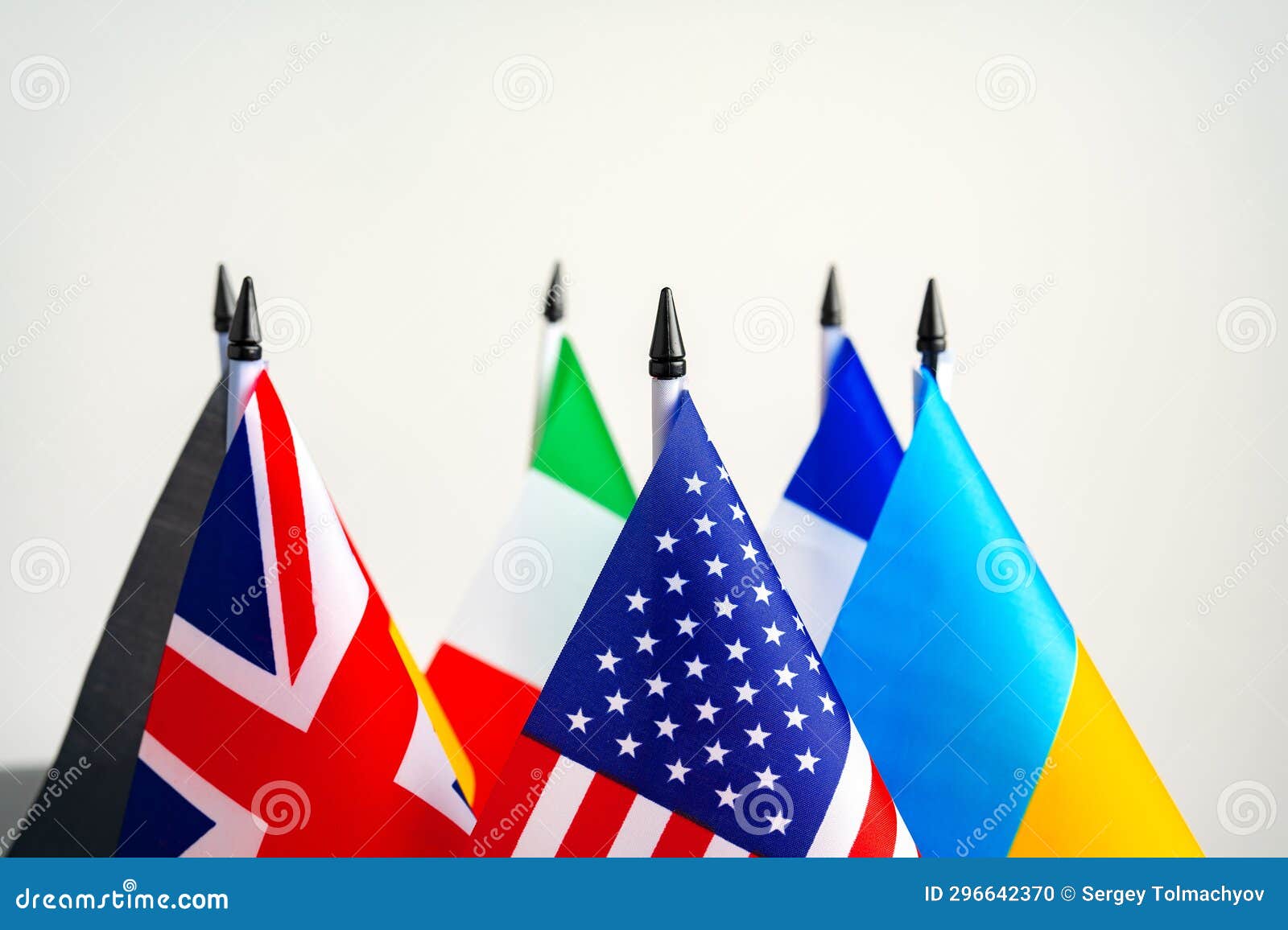 Lots of Small National Flags on Table Stock Photo - Image of flag, pole ...