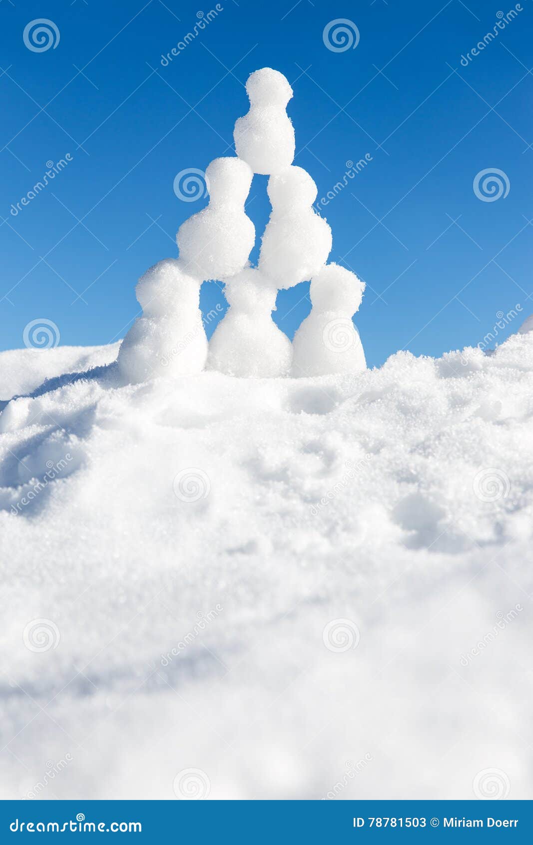 A Lots of Snow Figures Building a Pyramid in the Snow Stock Image ...