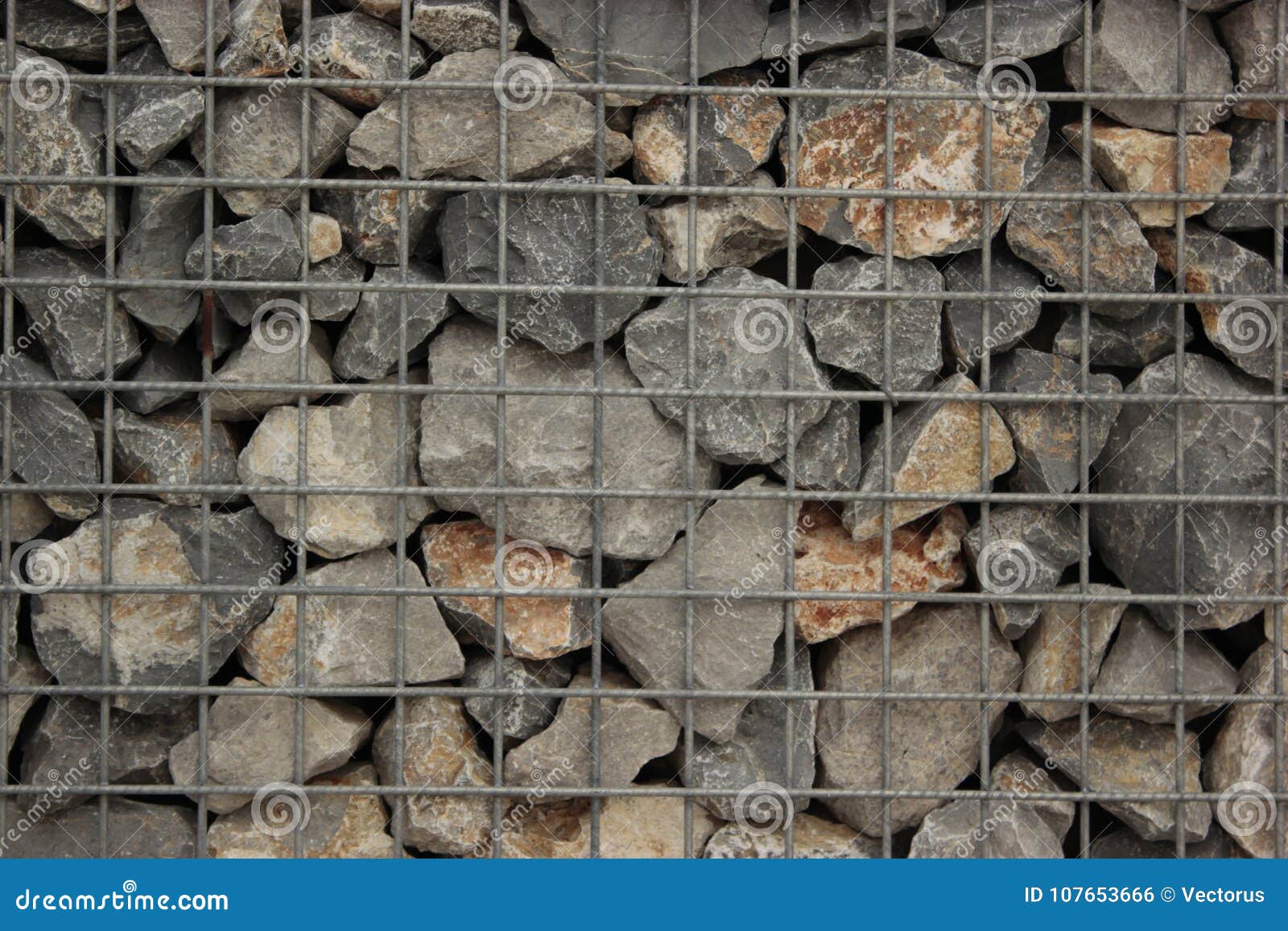 Lots of stones in a cage stock photo. Image of steel - 107653666