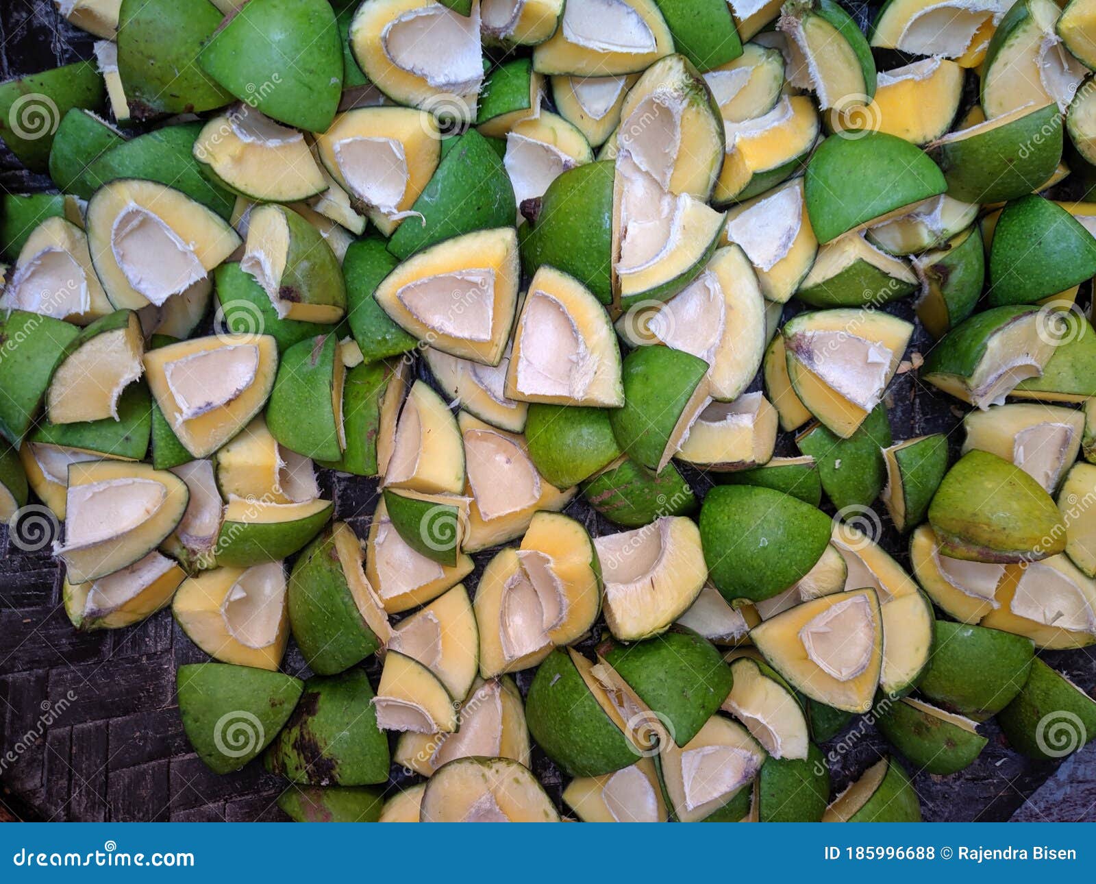 Lots Of Mango Flavor Ice Cream Balls In A Melting Process On Blue ...